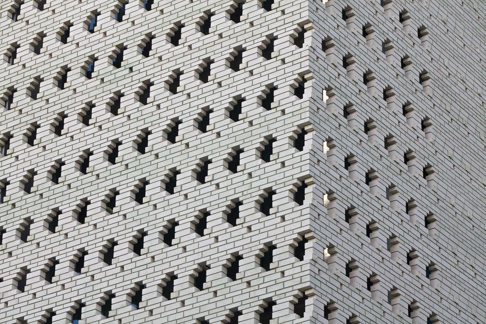 Brick brise-soleil: eight perforated brick facades lighting up ...