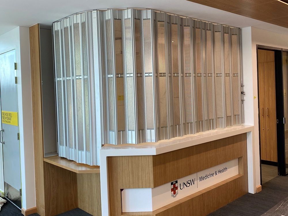 Slimline folding closure doors to secure counters, benchtops, serveries ...