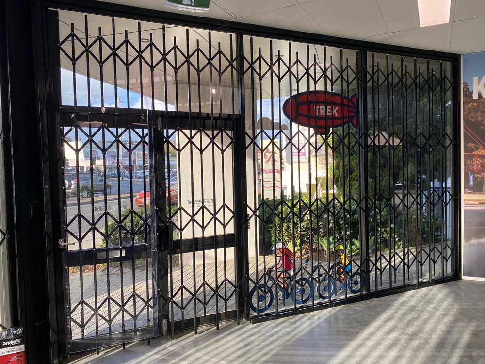 Commercial expanding doors compliant with Australian security standards ...