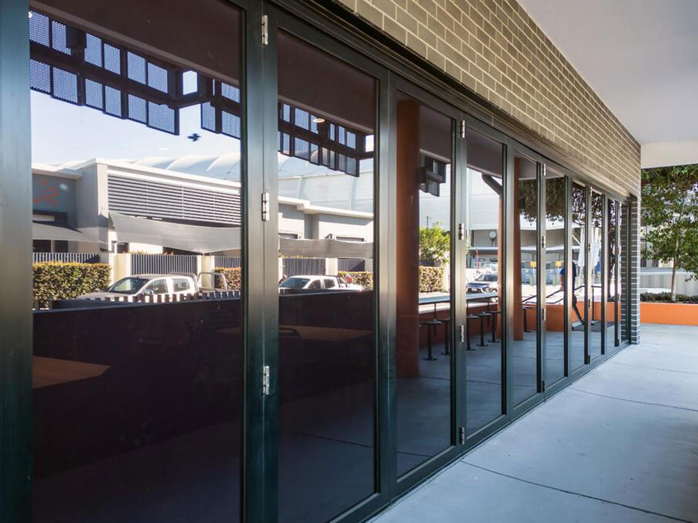 Well-designed stacking doors allow students to easily access and ...