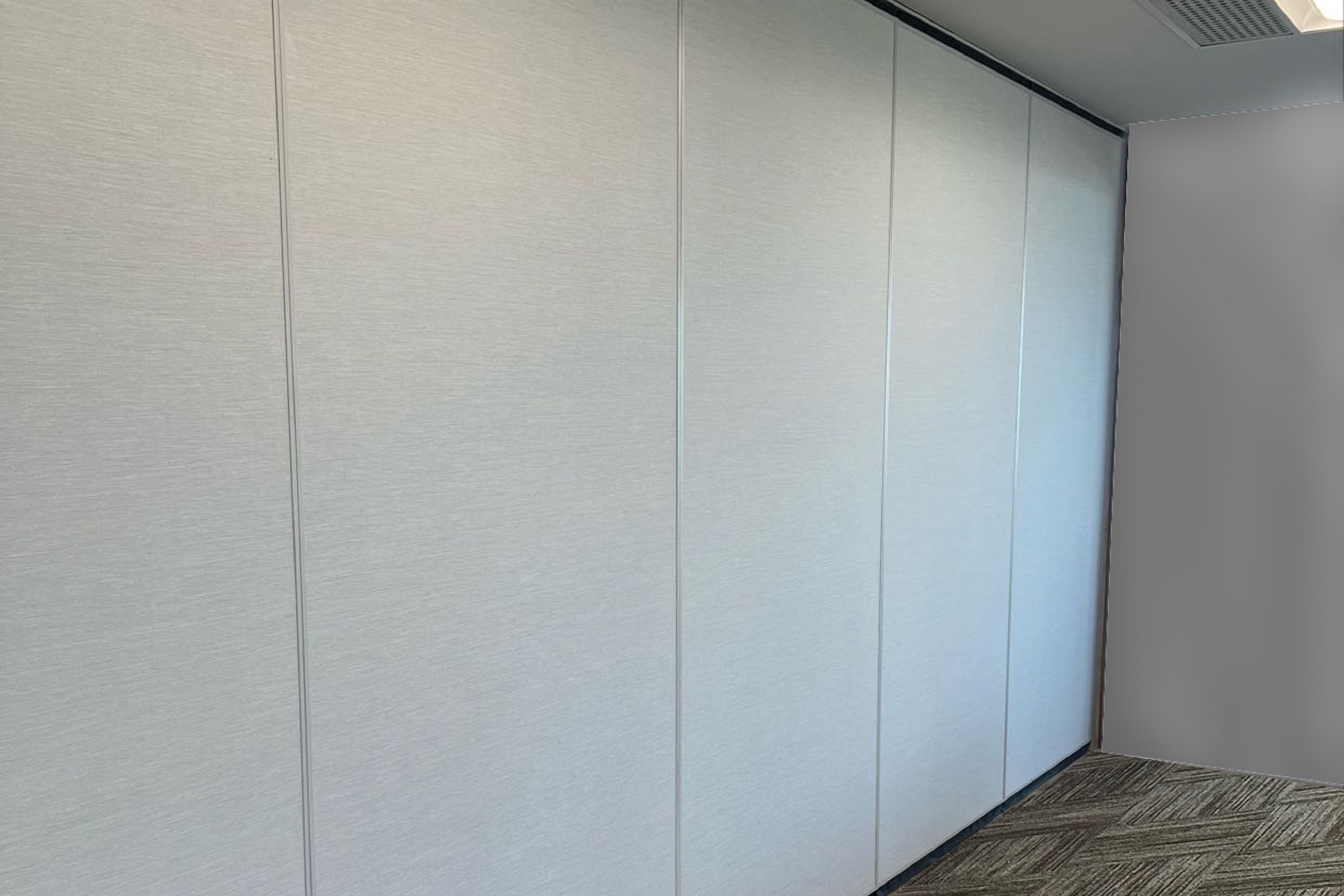 Bildspec's acoustic operable wall helps separate training area from ...