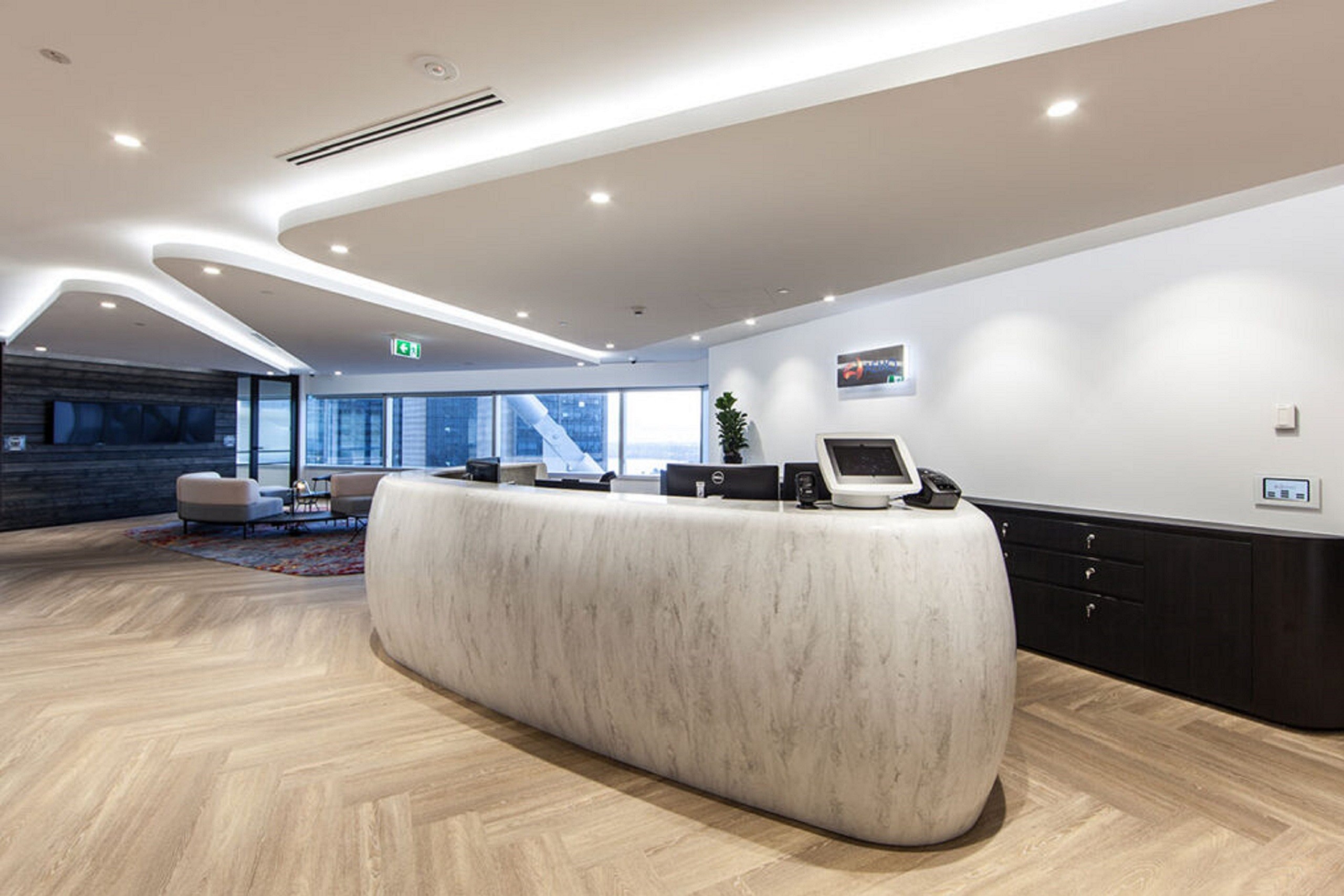Corian® turns reception desk at AEMO’s Perth HQ into a feature piece ...