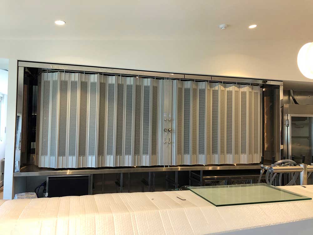 Stylish, functional perforated concertina doors maximising airflow ...