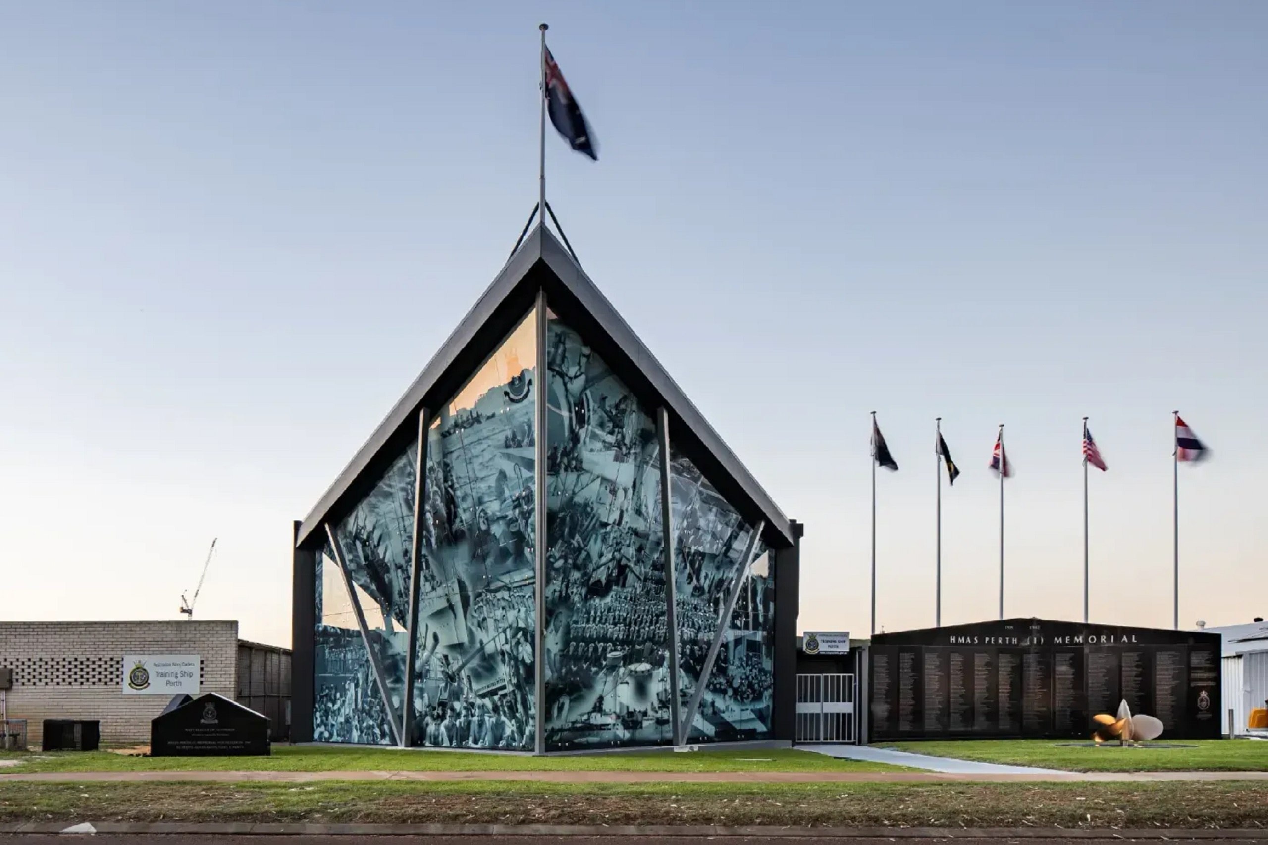 Striking installation with printed glass panels pays tribute to sailors ...