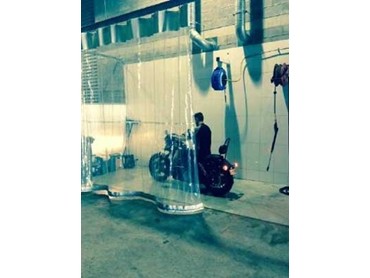 Flexshield supplies wash bay screen and PVC strip door to workshop ...
