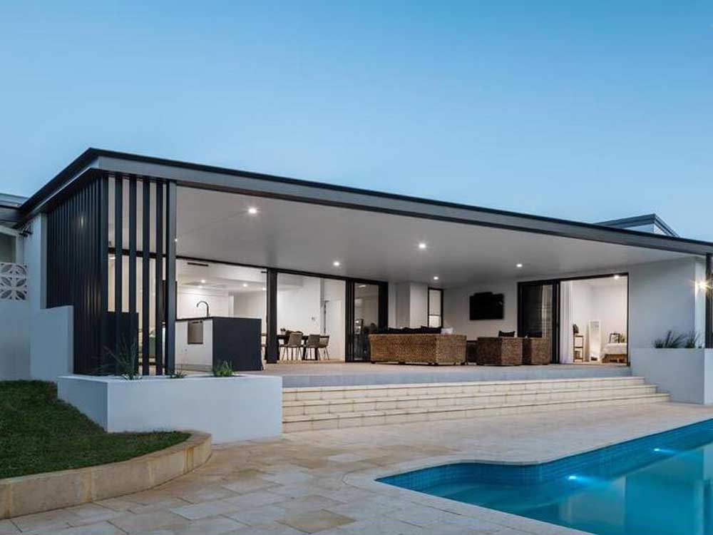 Renovated open plan home gets doors and windows to match | Architecture ...