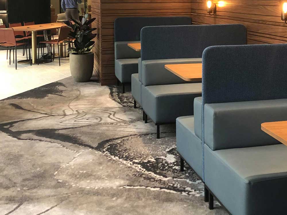Organic rock formations inspire custom carpet design for Gateway ...
