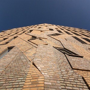 Jagged brickwork integrated into Haarlem housing-complex facade ...