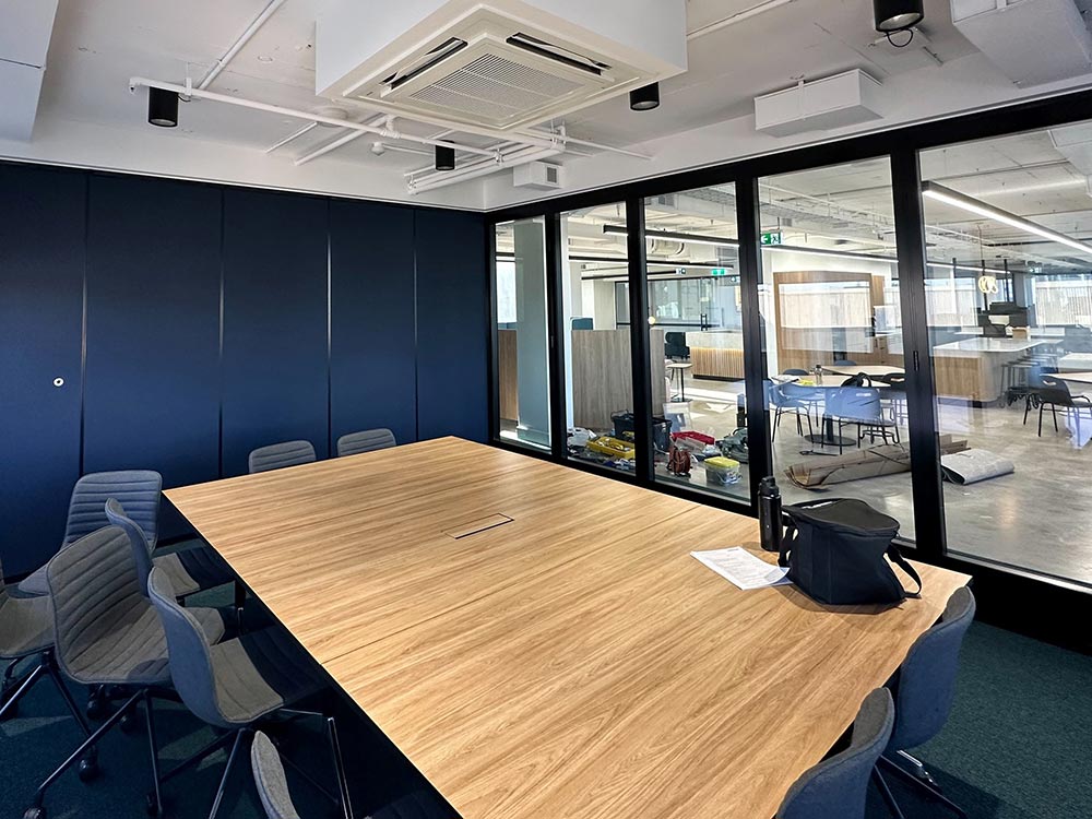 Acoustically controlled meeting areas created from large meeting space ...