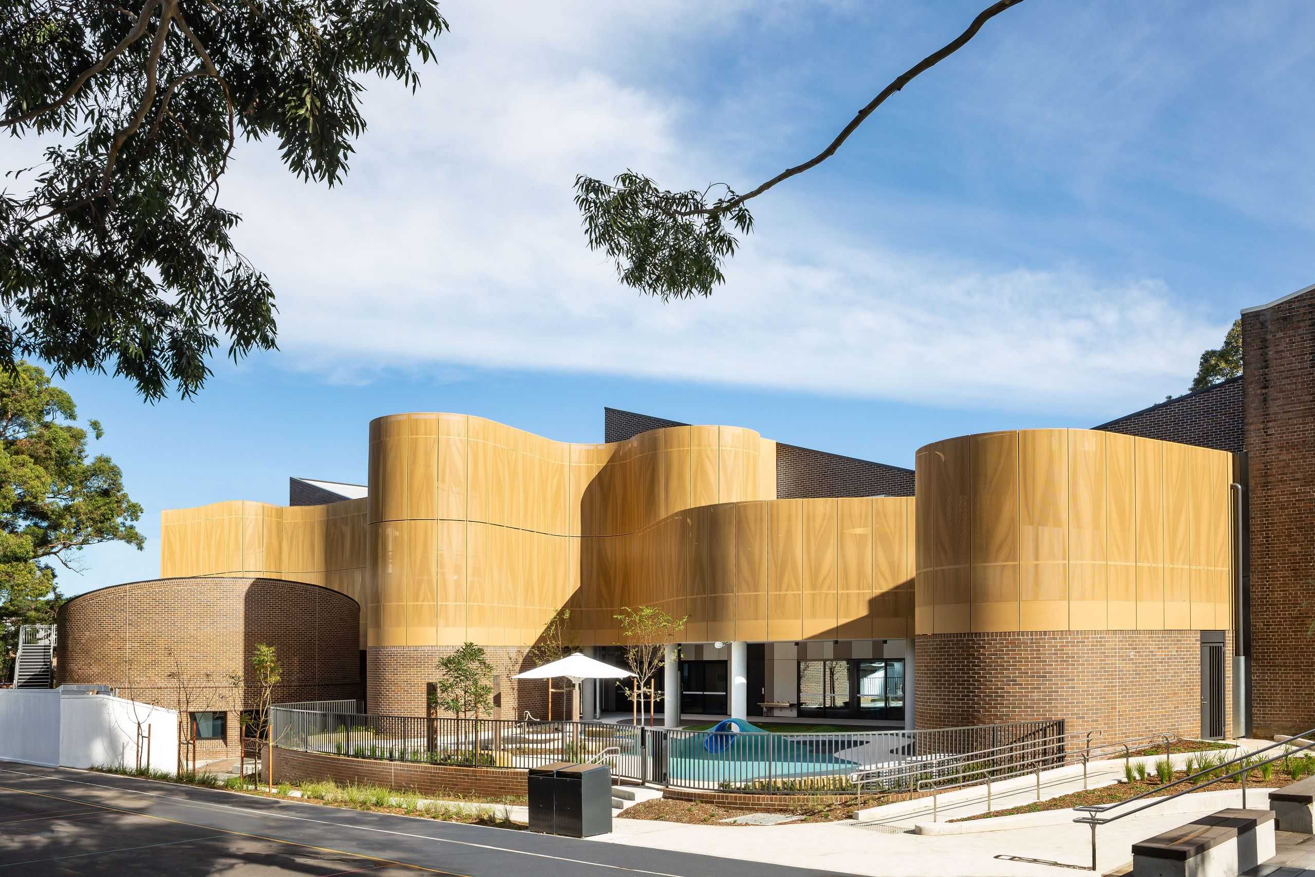 Bespoke perforated aluminium screens provide connection to the outdoors ...