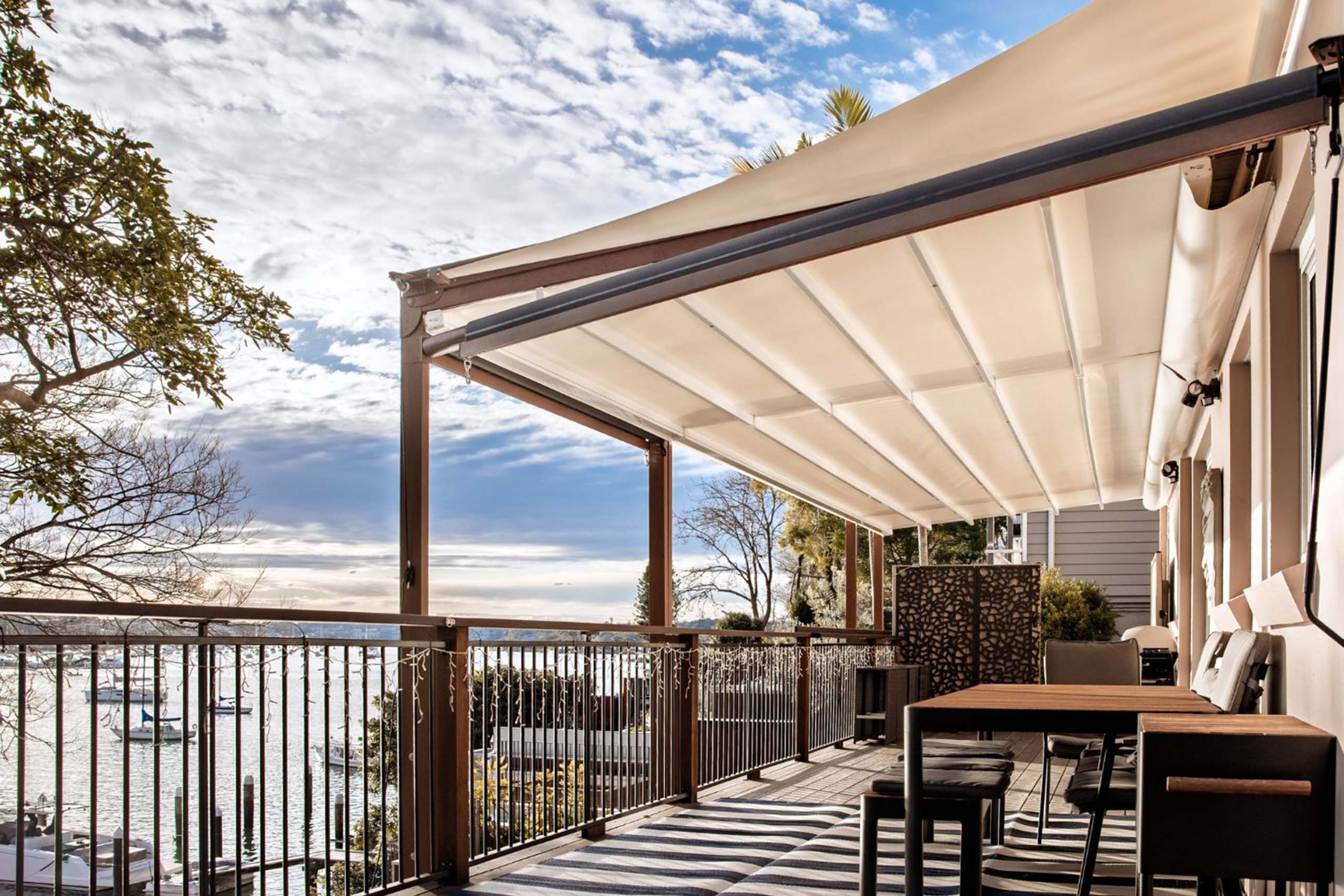MED EVO retractable fabric roof creates sheltered retreat ...