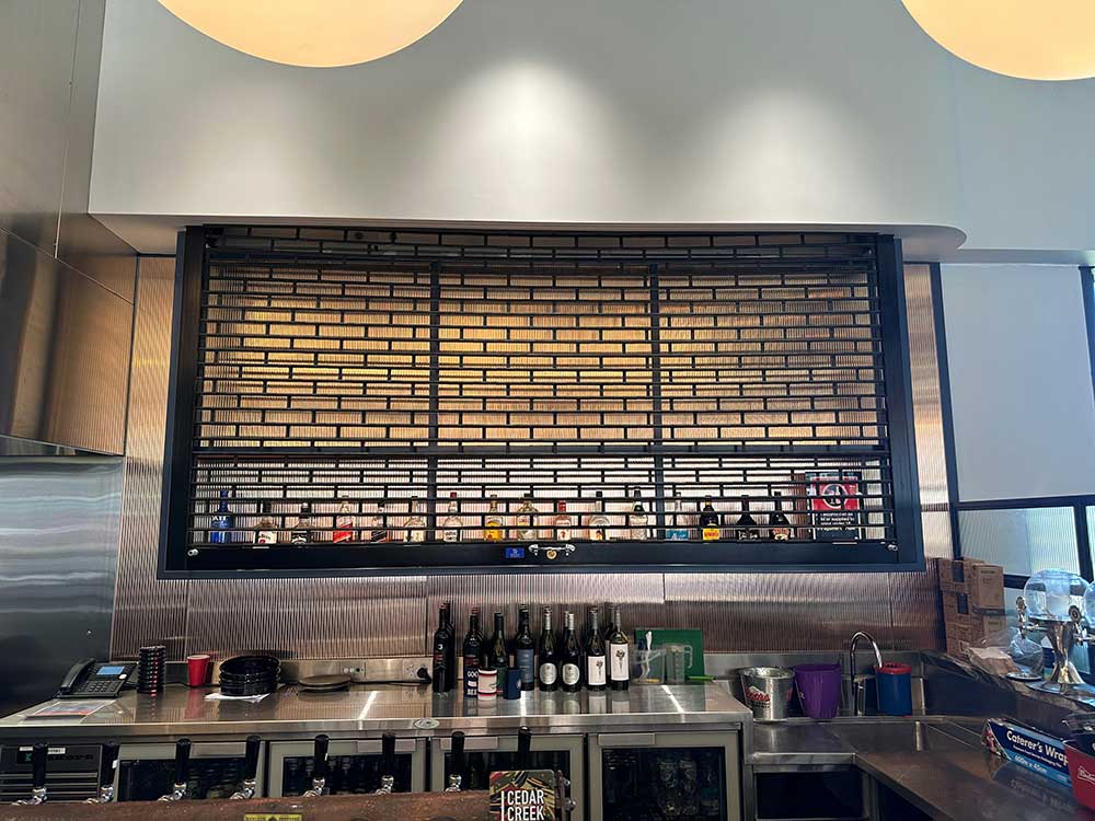 Heavy duty aluminium roller shutter secures bar counter at The Sherwood ...
