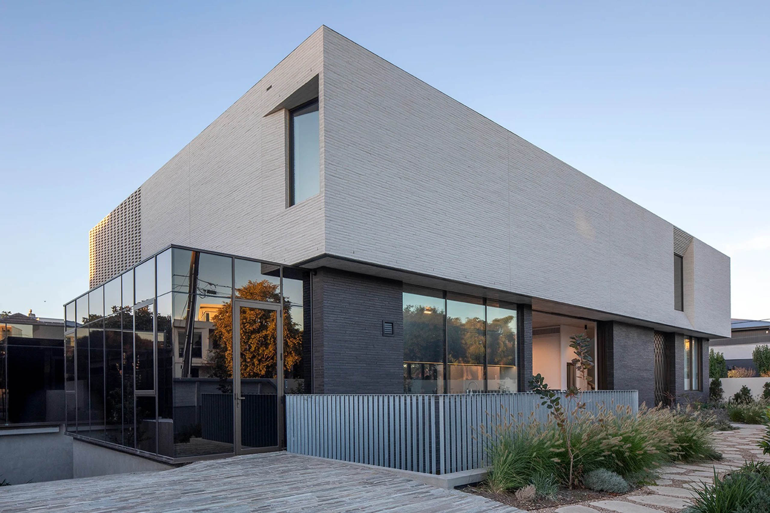 Material palette centres on handmade Petersen bricks at Brise House ...