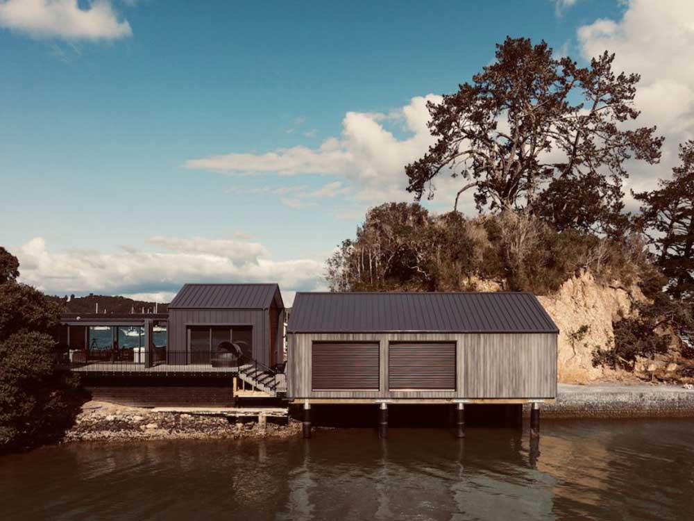 Composite timber meets architectural brief for boathouse in marine ...