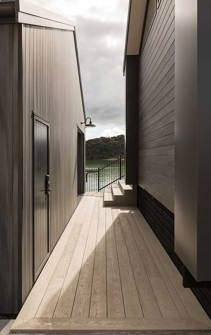 Composite timber meets architectural brief for boathouse in marine ...