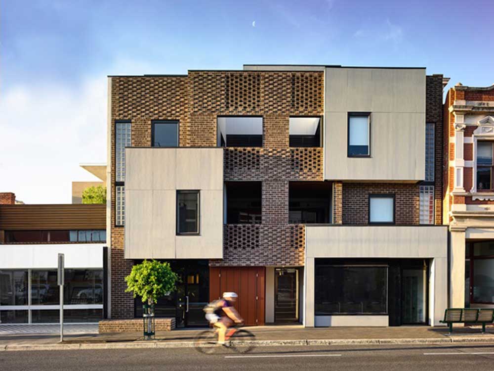 Brick connects modern multi-residential building to its heritage ...